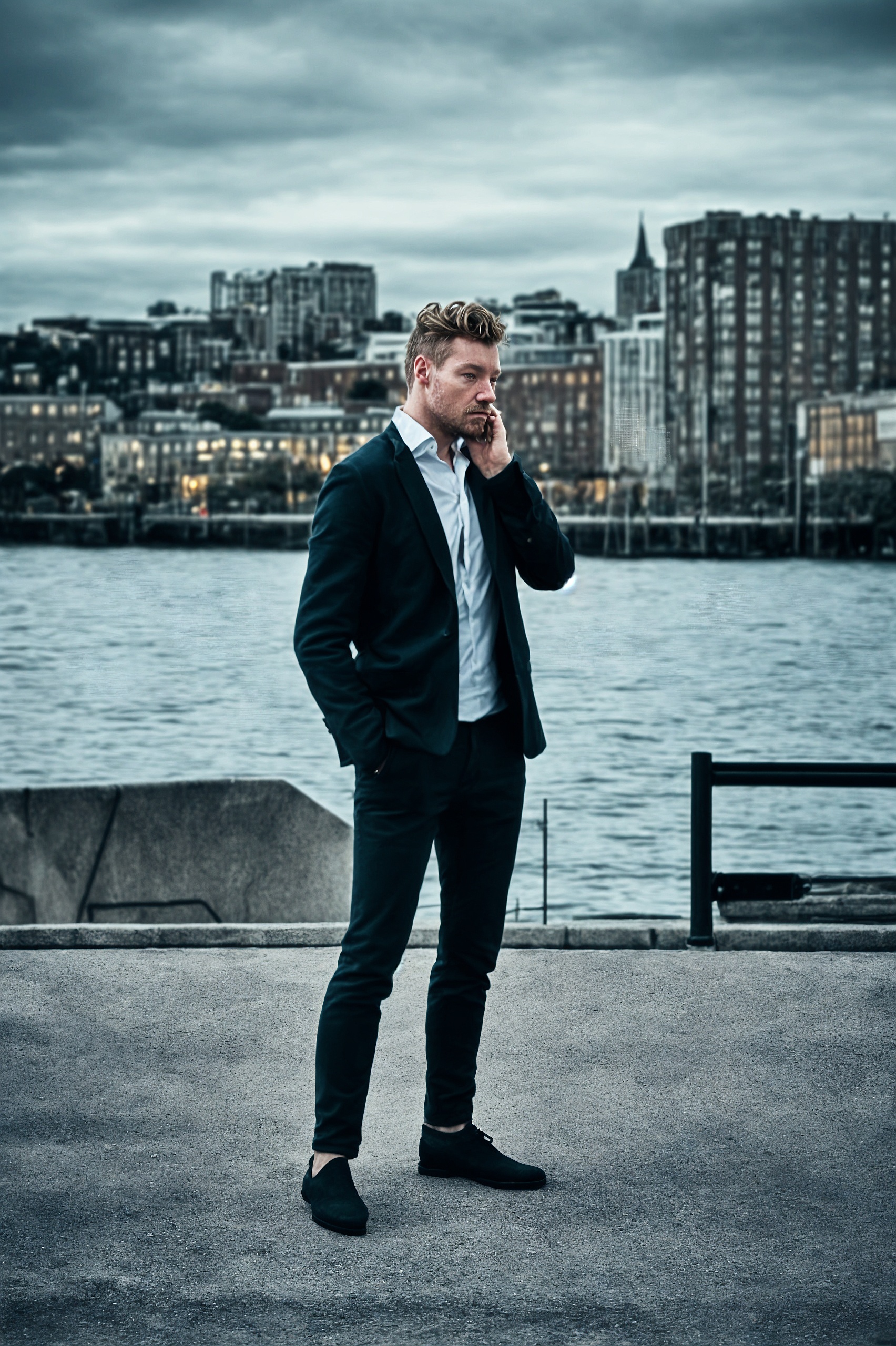 A captivating masculine man enjoying a peaceful moment by the ...