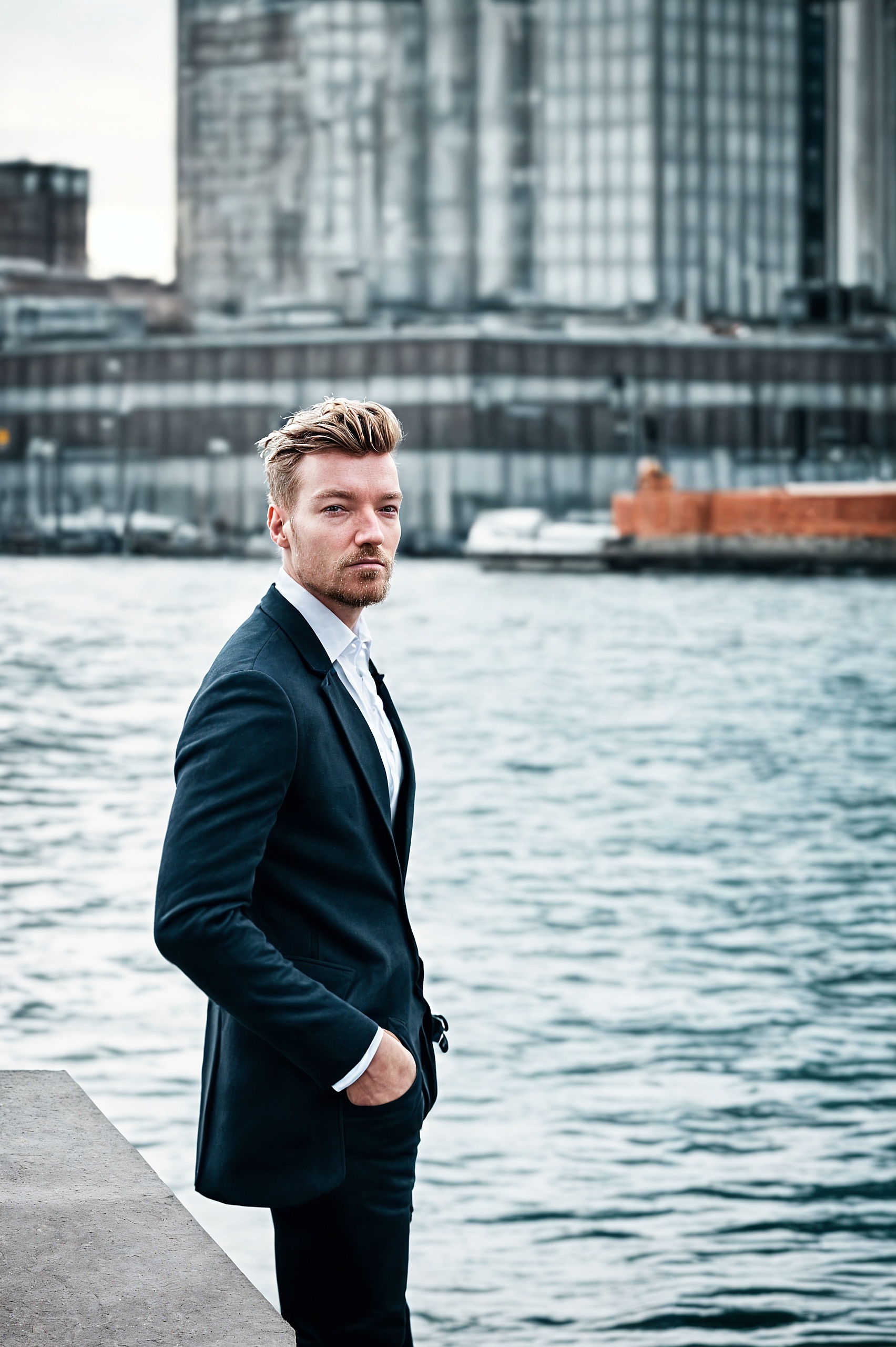 A captivating masculine man enjoying a peaceful moment by the ...